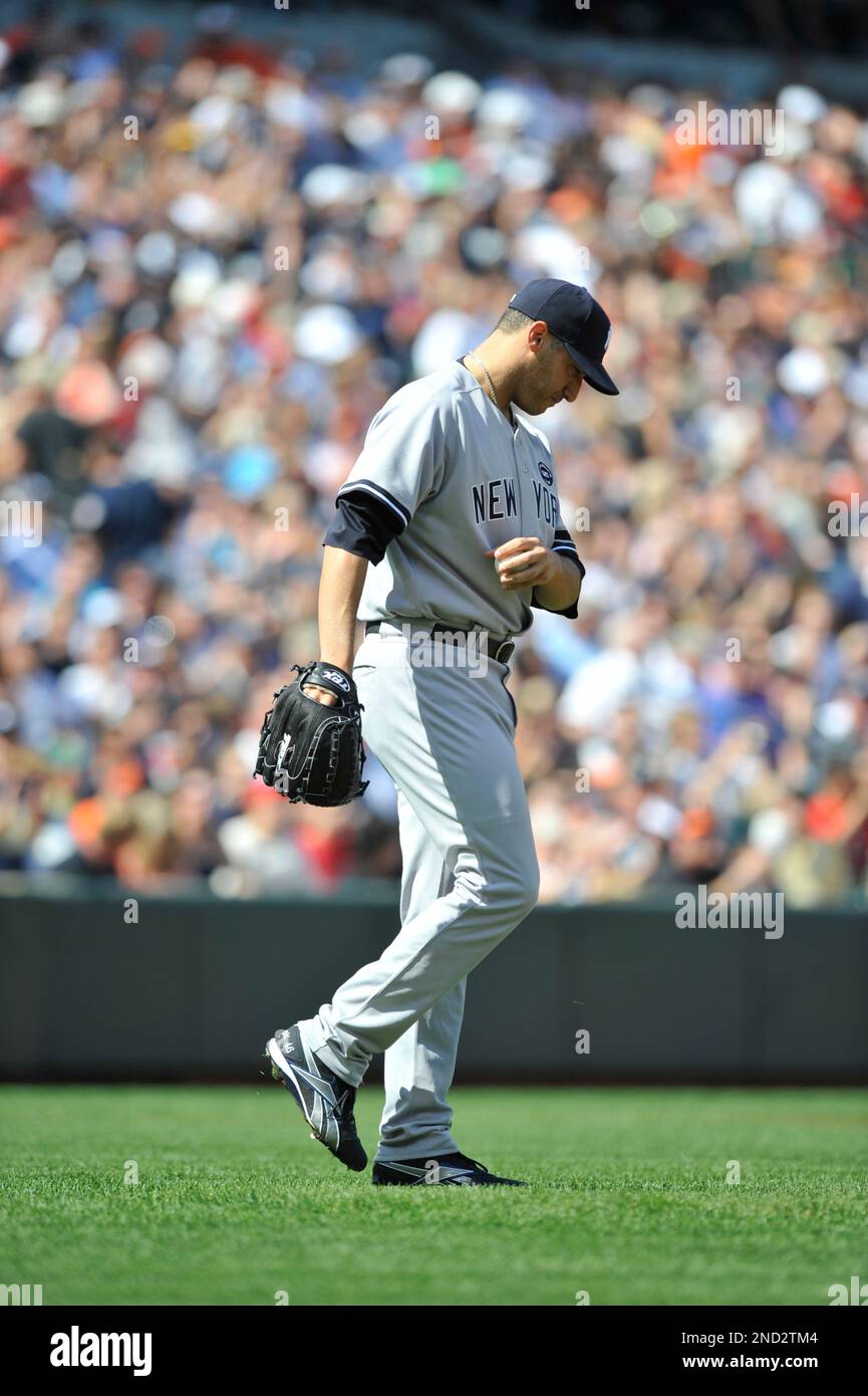 New York Yankees pitcher Andy Pettitte walks to the mound against the ...