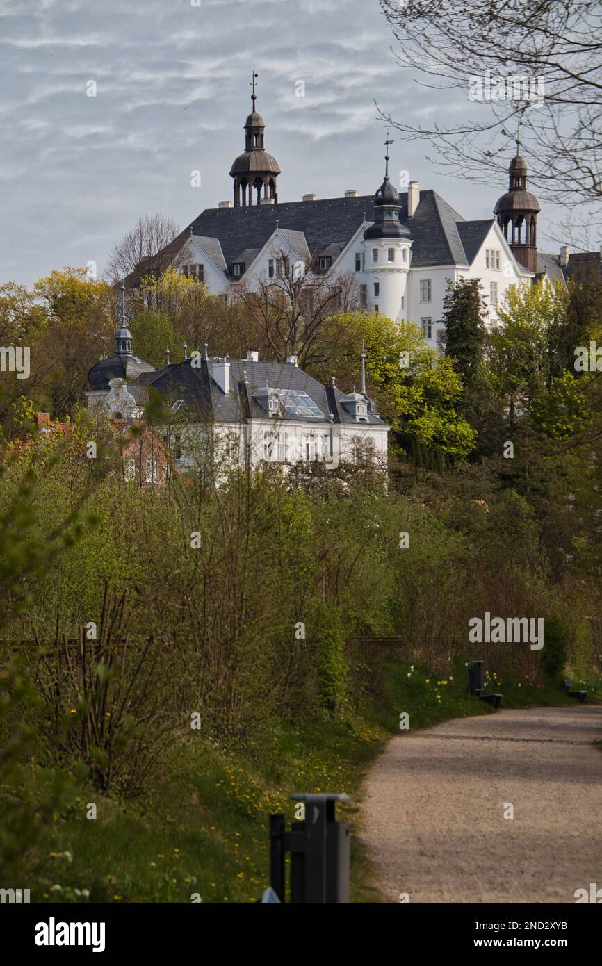 The Plon castle in Germany between the trees Stock Photo - Alamy