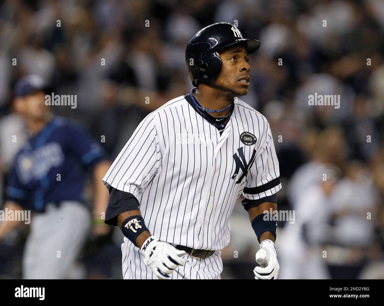 Tampa Bay Rays relief pitcher Grant Balfour, left, watches along with ...