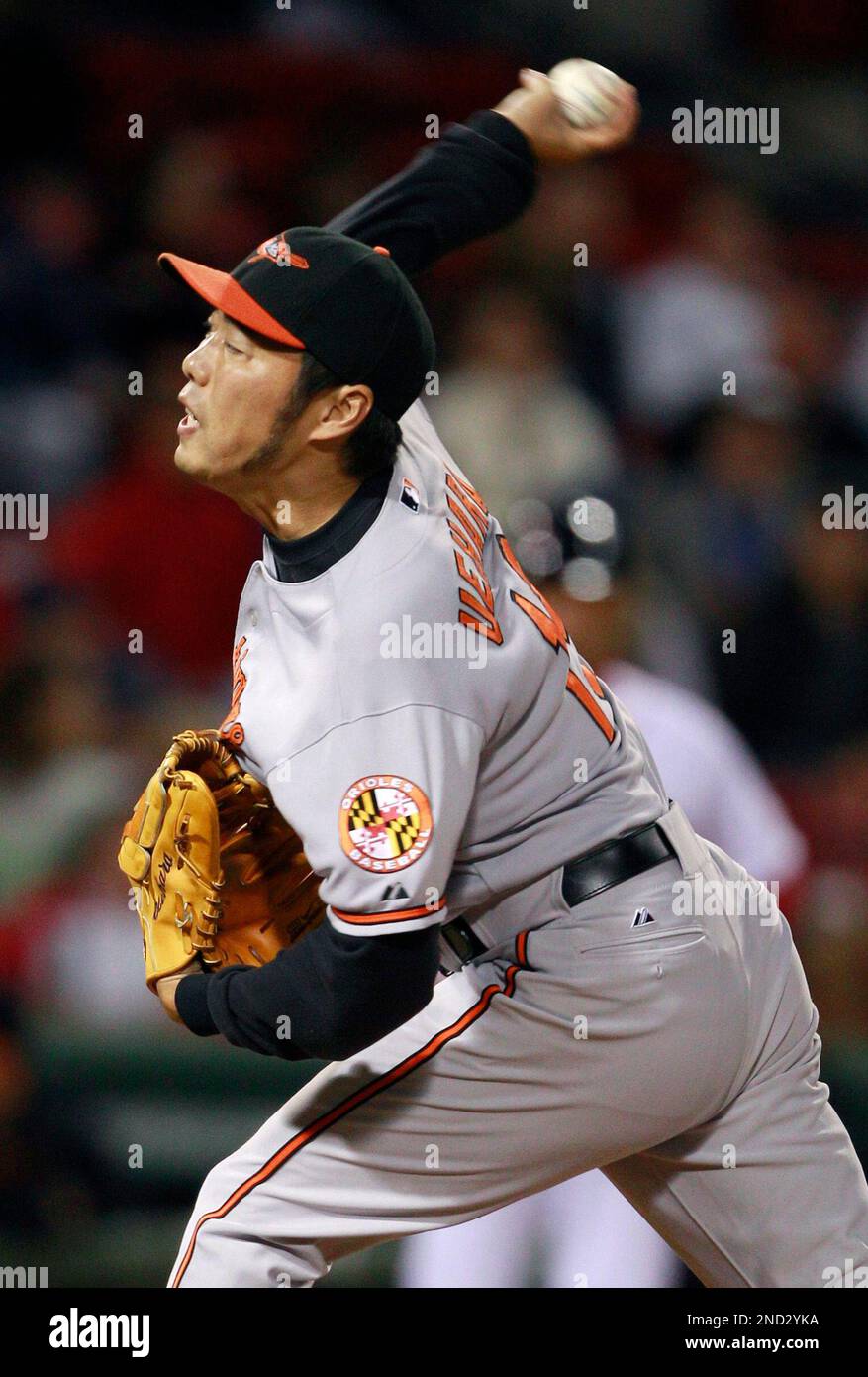 Baltimore Orioles pitcher Koji Uehara delivers against the Boston Red ...