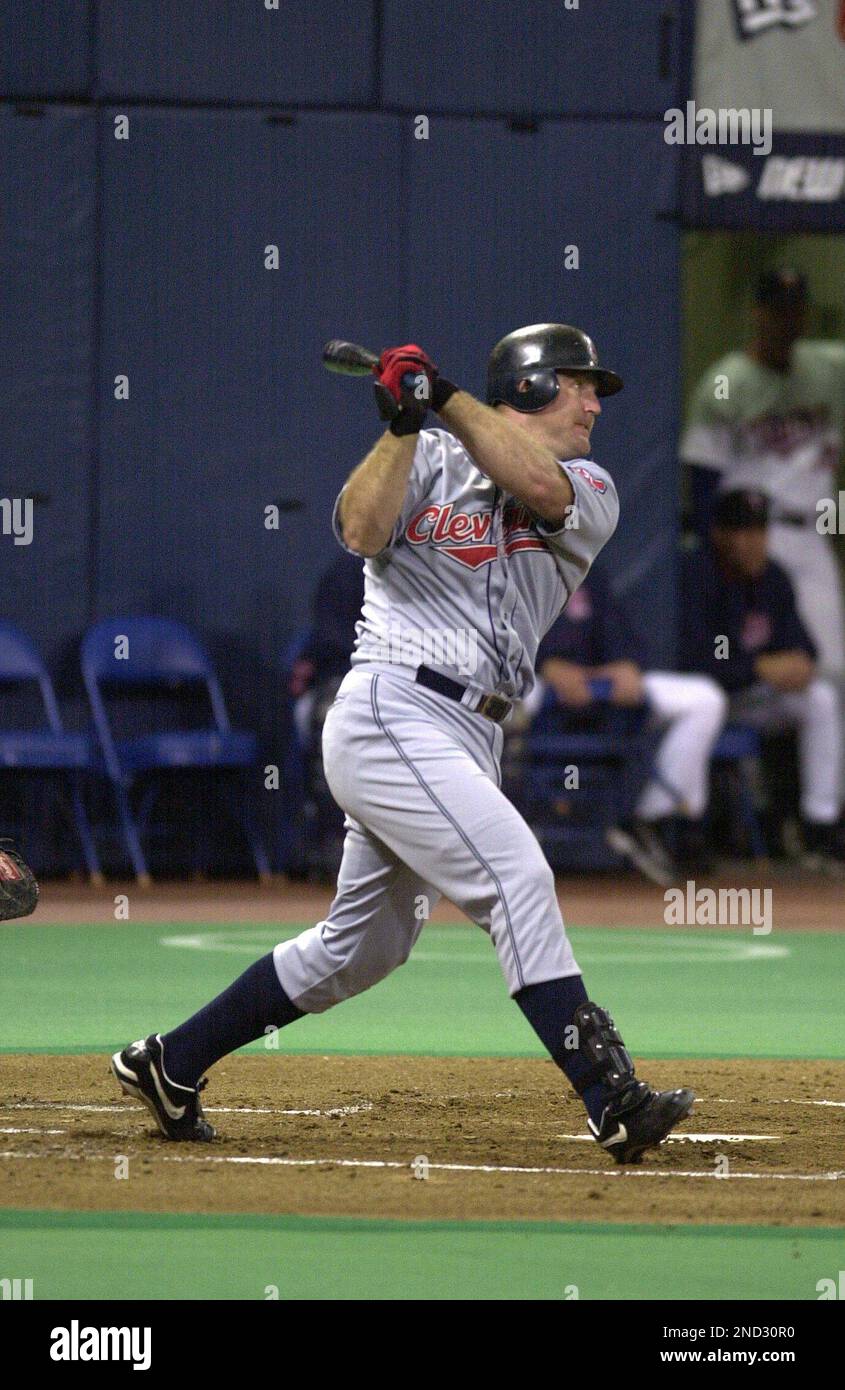 Cleveland Indians Jim Thome hits a solo home run off Minnesota Twins ...