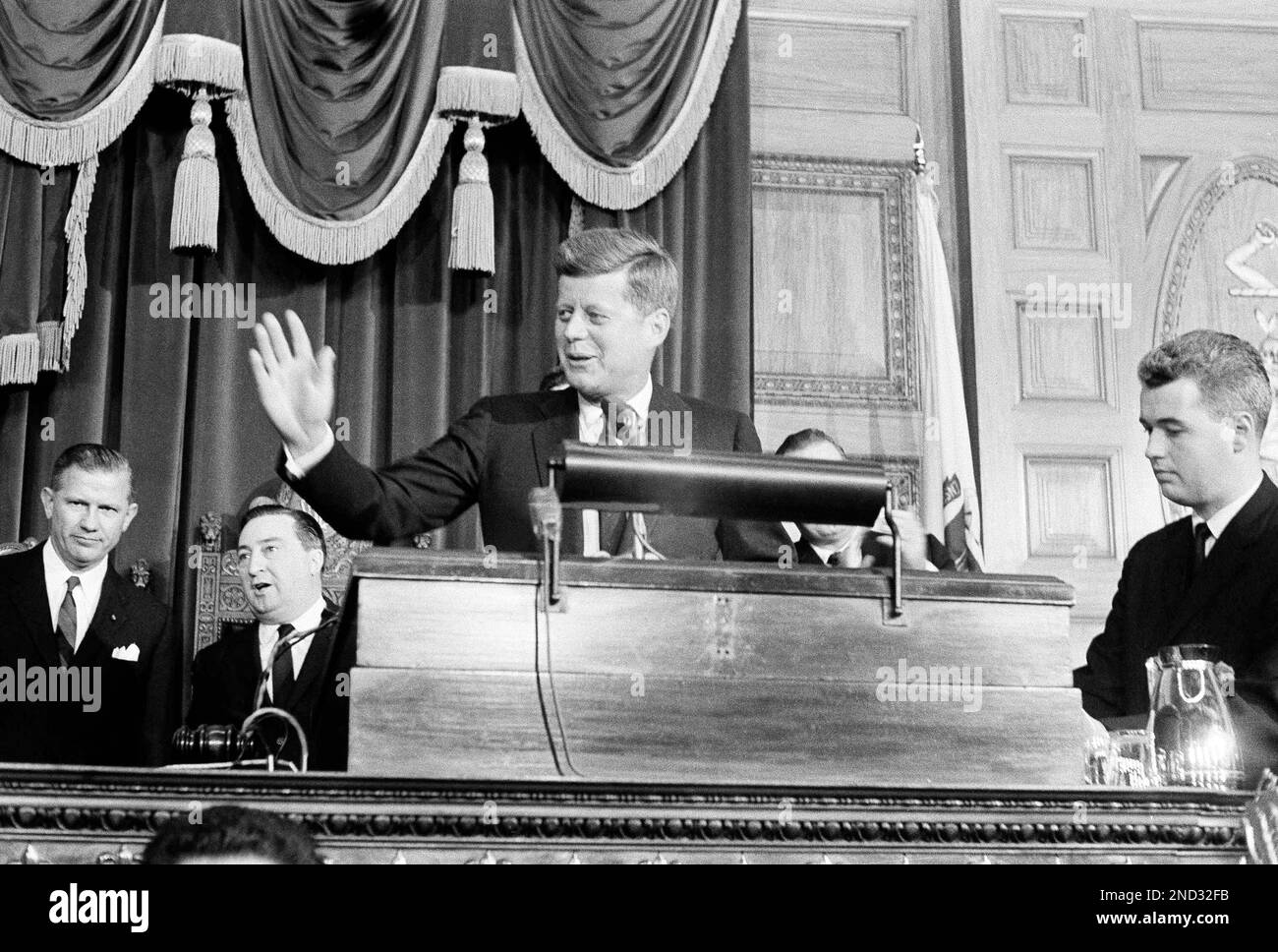 President elect John F. Kennedy acknowledges applause as he talks to ...