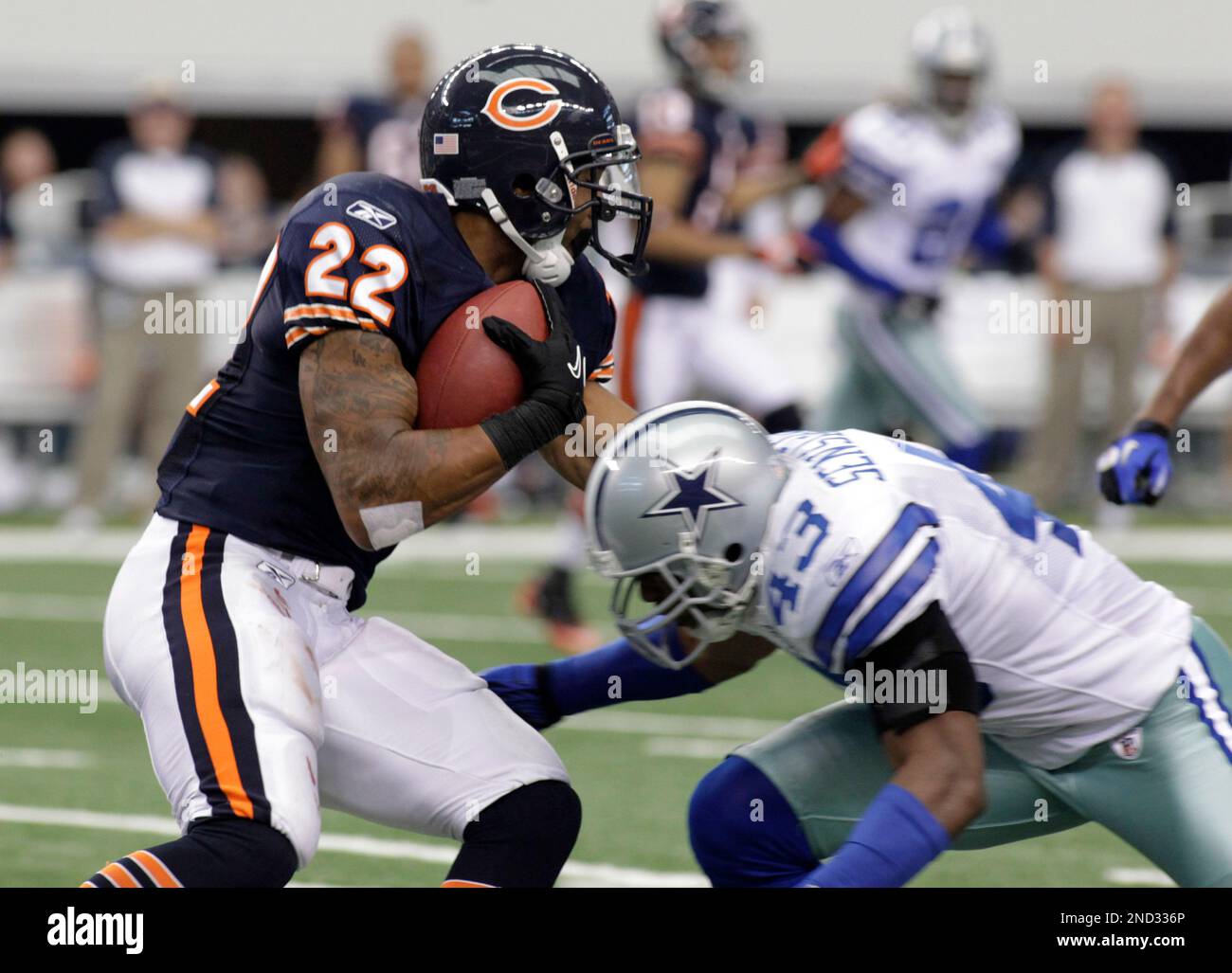 Chicago Bears running back Matt Forte (22) and Dallas Cowboys safety ...