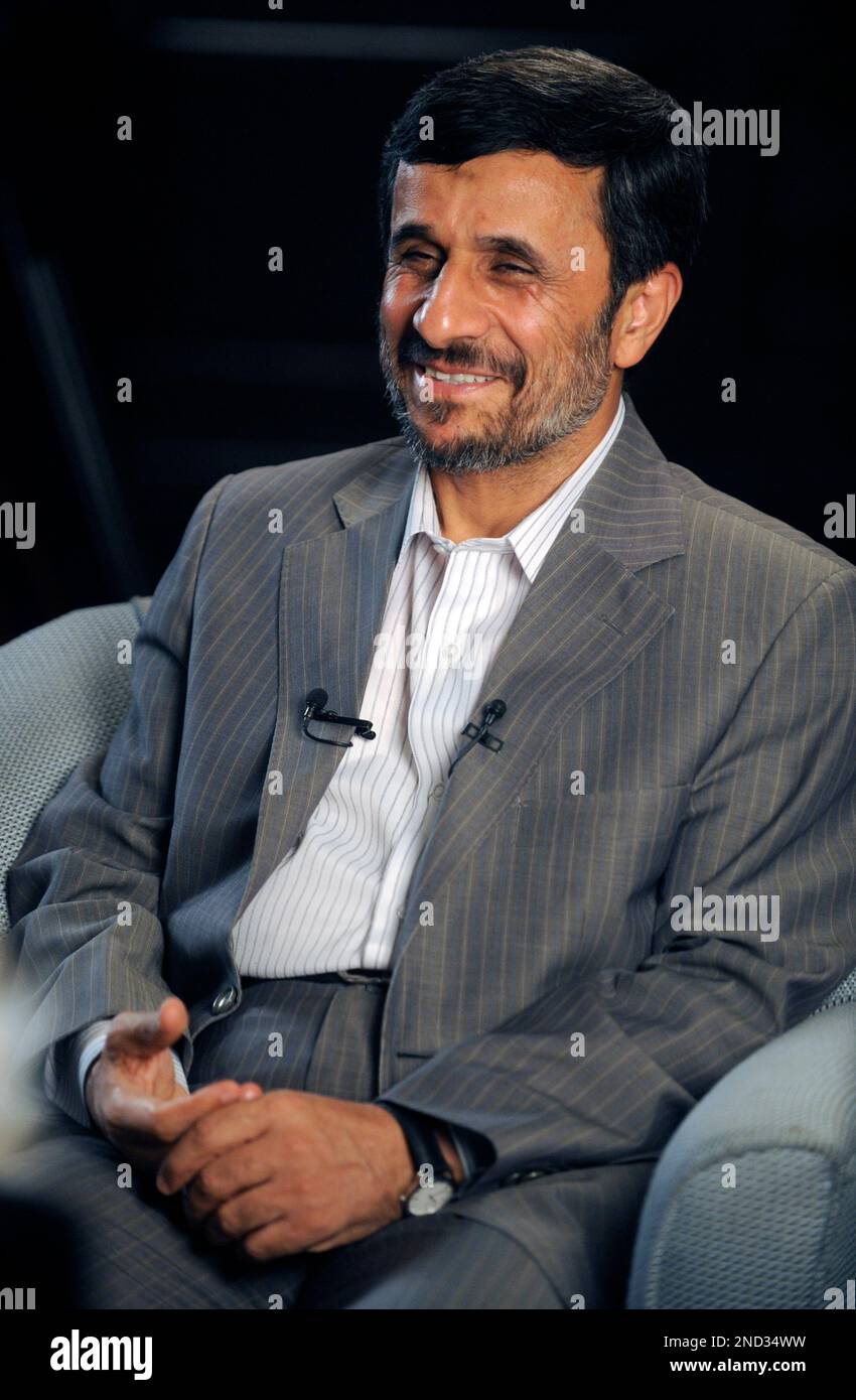 Iranian President Mahmoud Ahmedinejad is interviewed by journalists ...