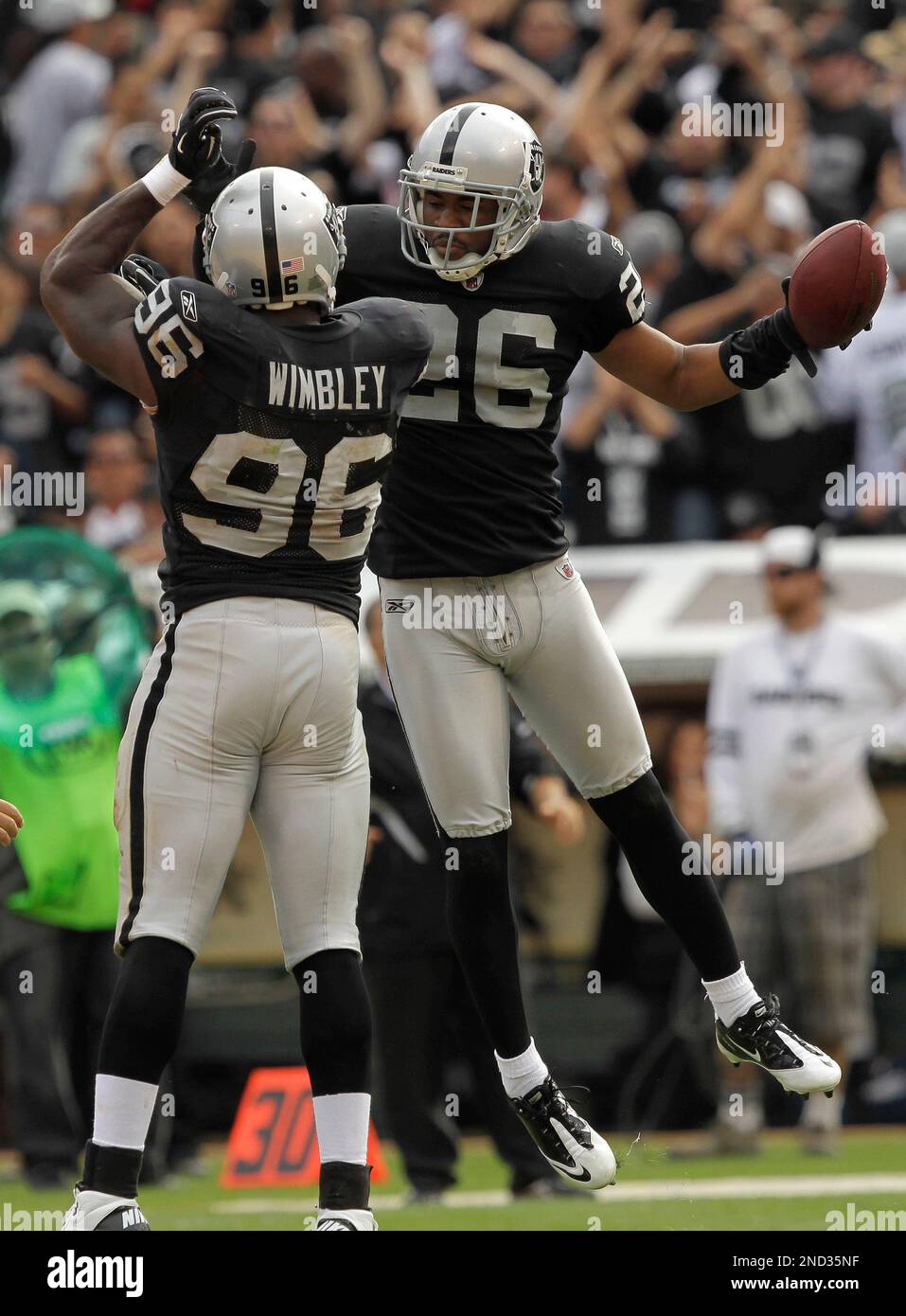 Oakland Raiders cornerback Stanford Routt (26) celebrates his ...