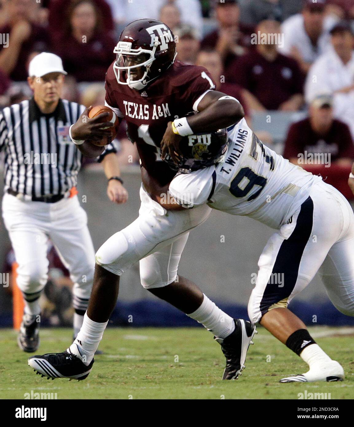Texas A&M quarterback Jerrod Johnson (1) is tackled by Florida ...
