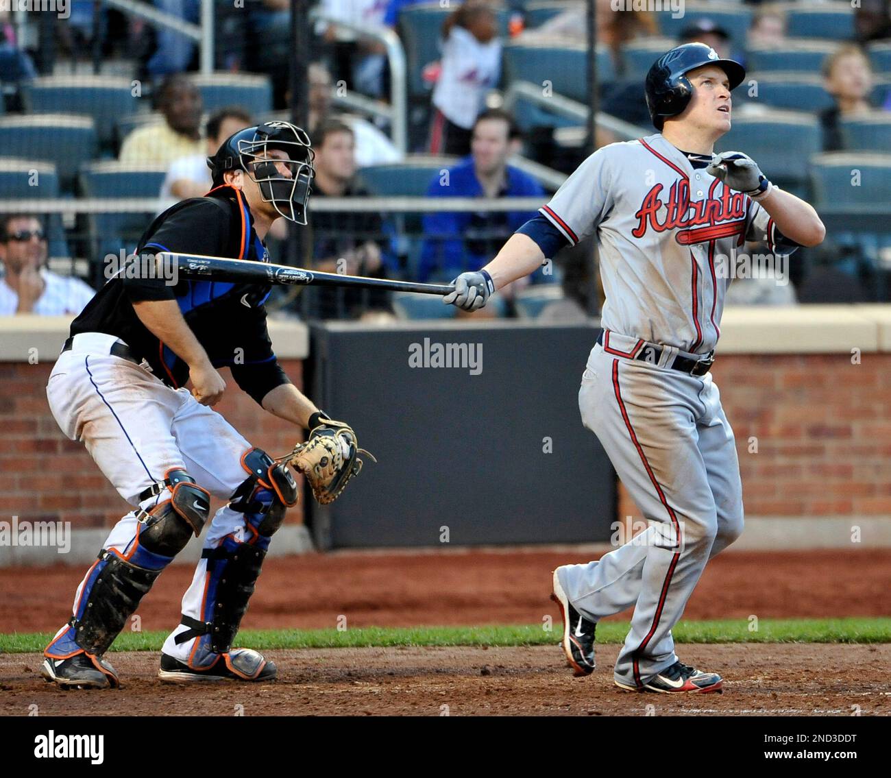 New York Mets catcher Josh Thole, left, and Atlanta Braves' Nate ...