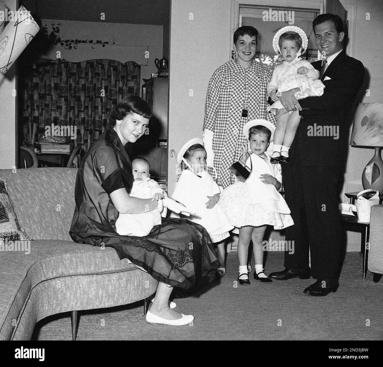 Singer Pat Boone and his family prepare to leave their home for church ...