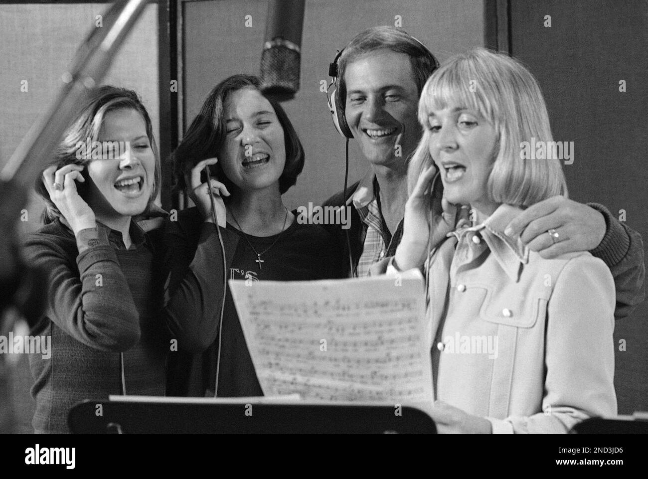 Singer Pat Boone sings with daughters Debby, 21, Lindy, 22 and his wife ...