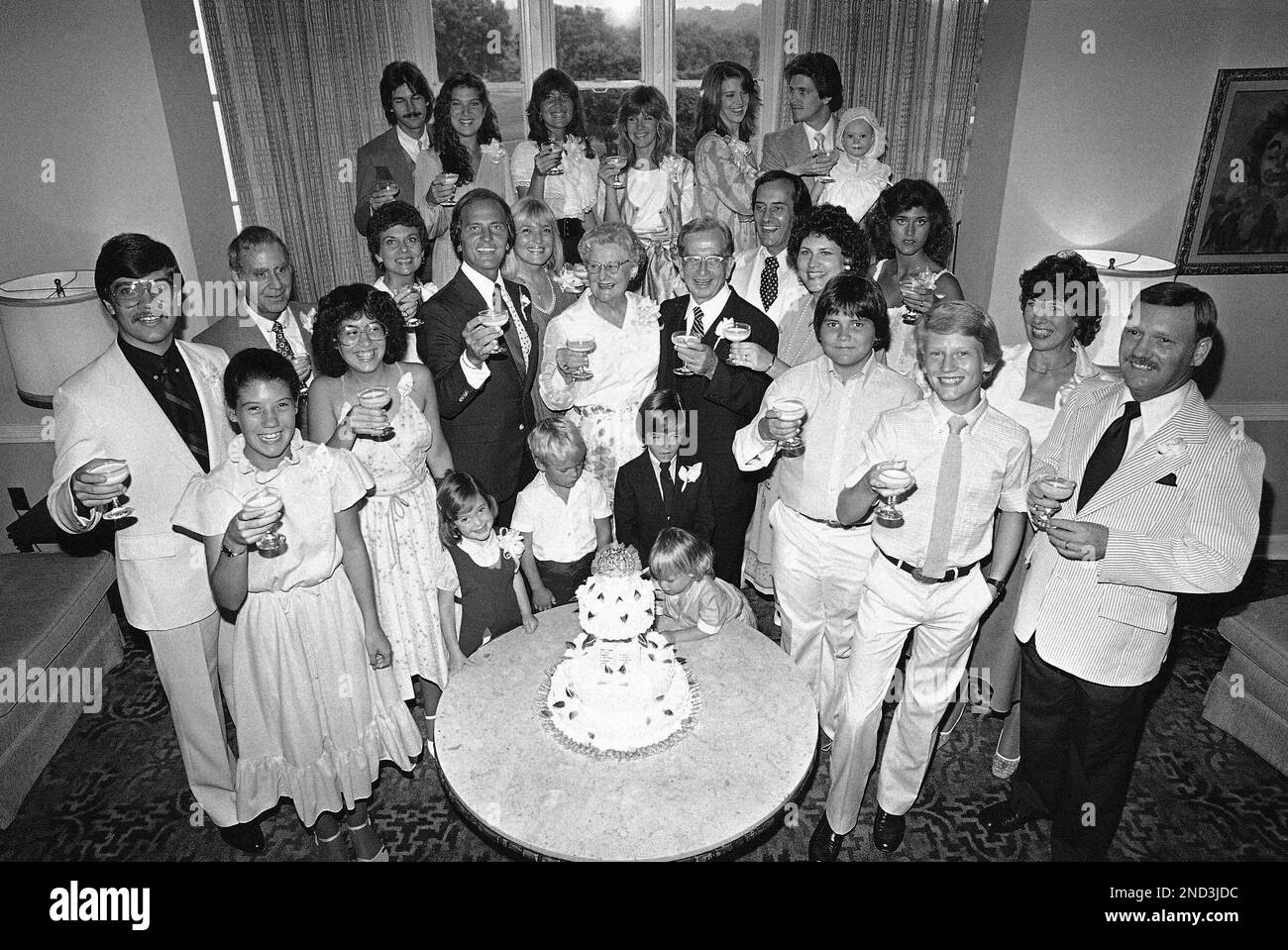 Four of the five generations of the family of singer Pat Boone, give a ...