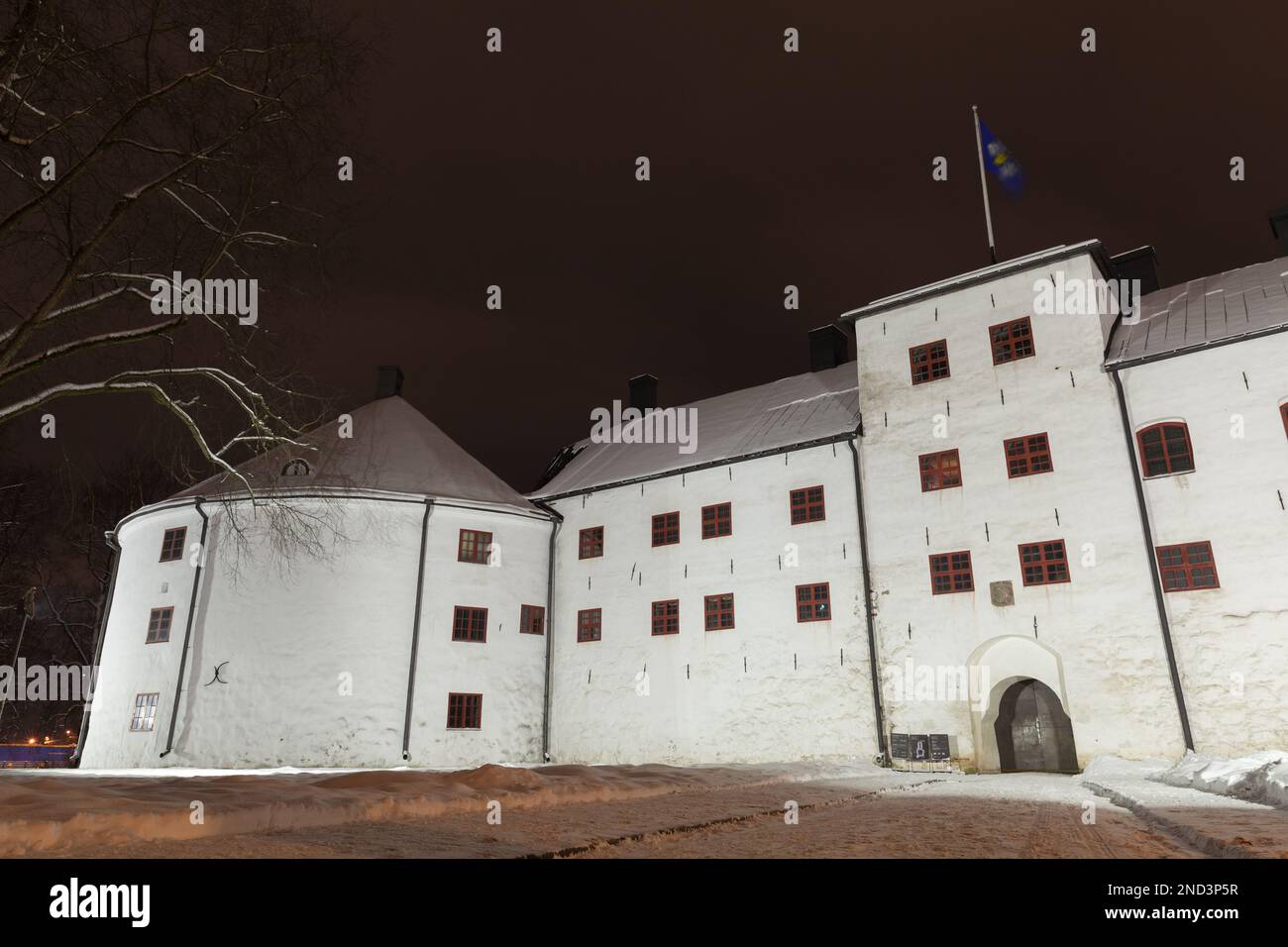 Illuminated Turku Castle exterior at night, it is a medieval building ...
