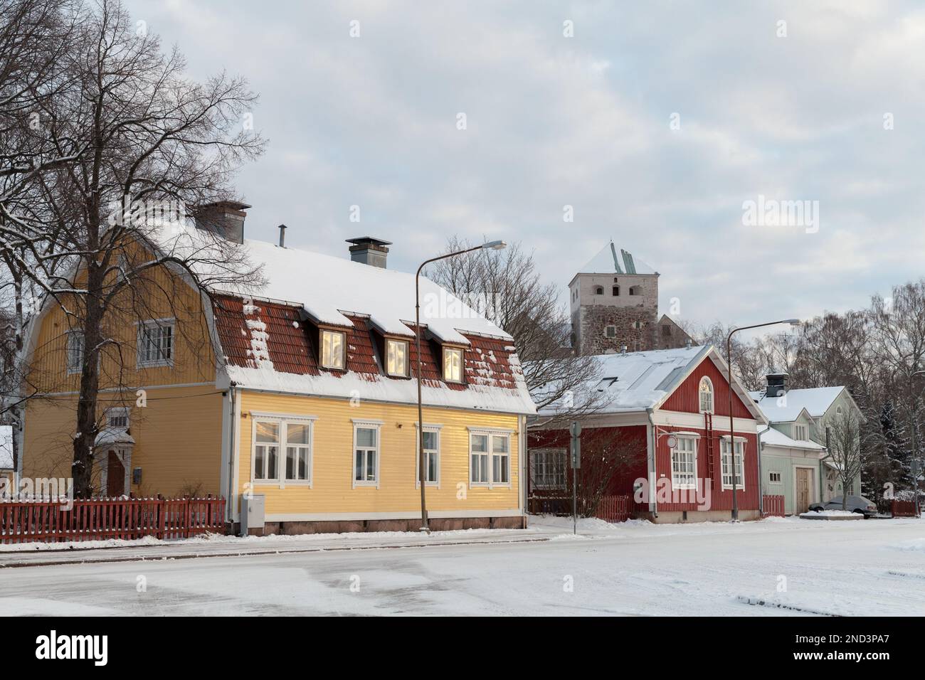 Street view of Turku on a winter day. Old residential houses and Turku ...