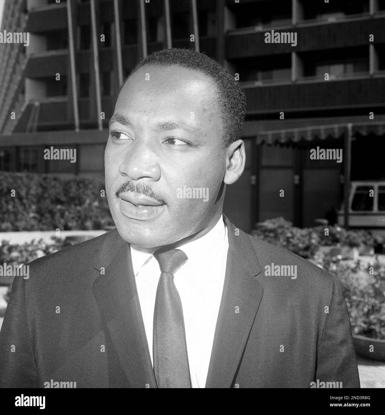 Civil rights leader Martin Luther King stands outside his hotel in Rome ...