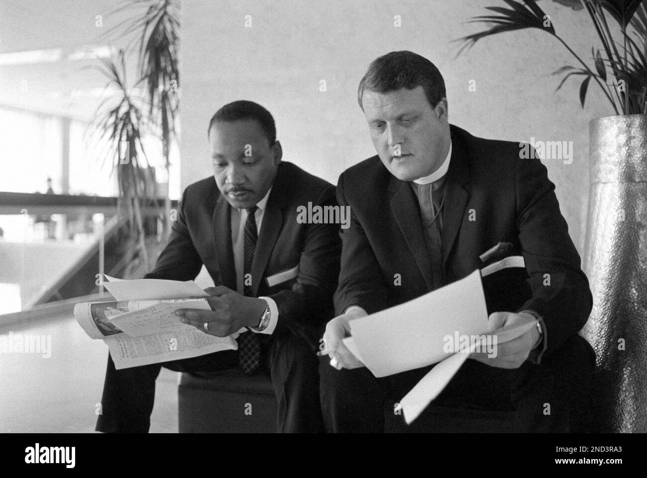 Martin Luther King, U.S. civil rights leader, sits with the Right Rev ...