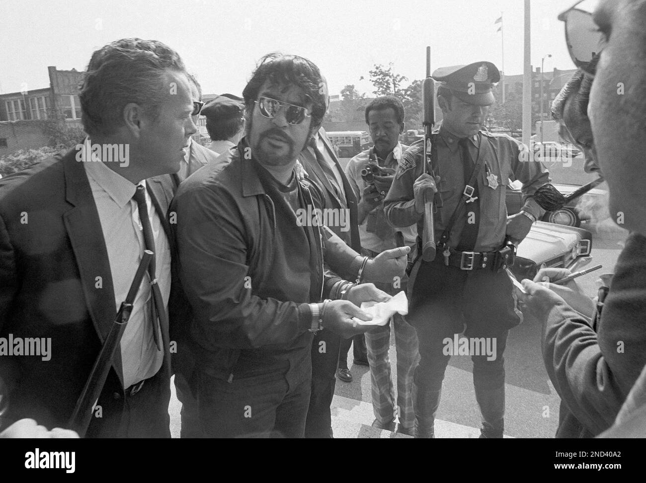 One time underworld informer Joseph (Barboza) Baron stops on the steps ...