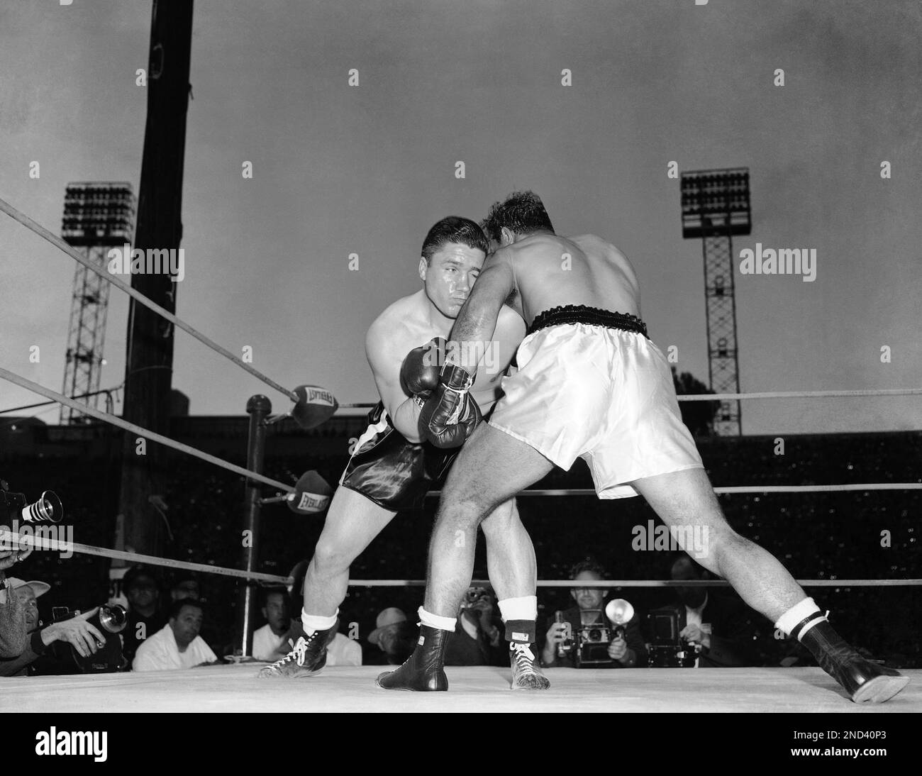 Champion Rocky Marciano in white trunks and challenger Don Cockell in ...