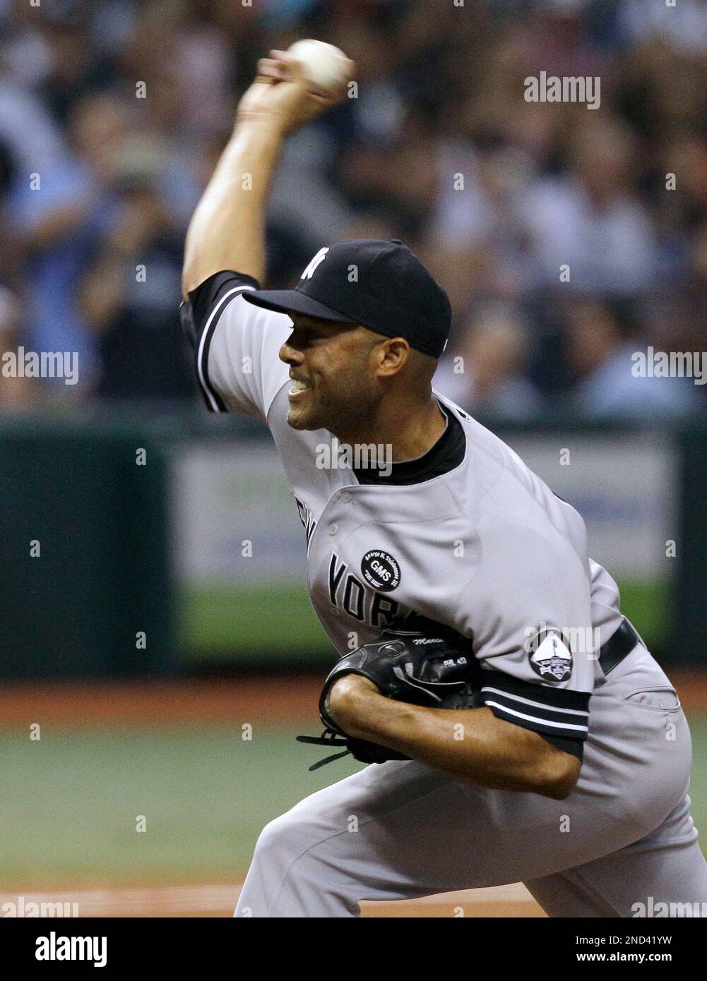 New York Yankees relief pitcher Mariano Rivera delivers a 10th-inning ...