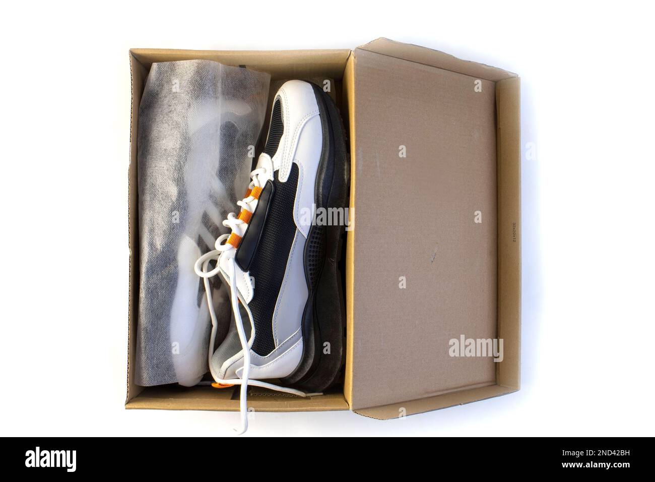 Cardboard box white sneakers Cut Out Stock Images & Pictures - Alamy