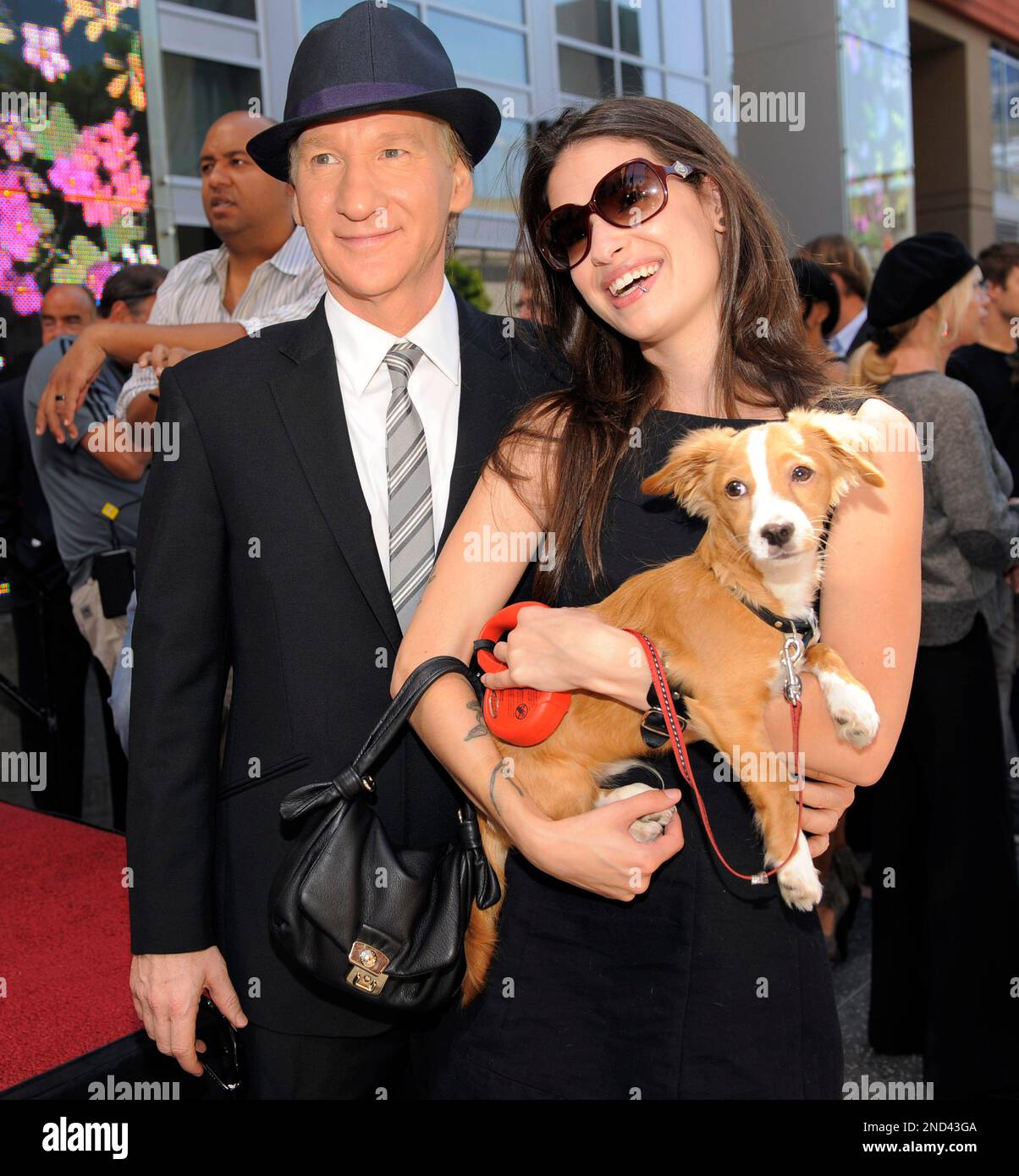 Comedian and television host Bill Maher, left, poses with his ...