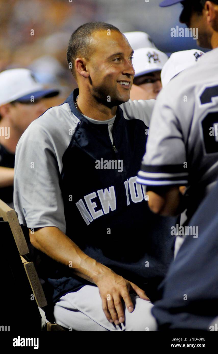 Derek Jeter sits out a baseball game in Arlington,Texas, Saturday, Sept ...