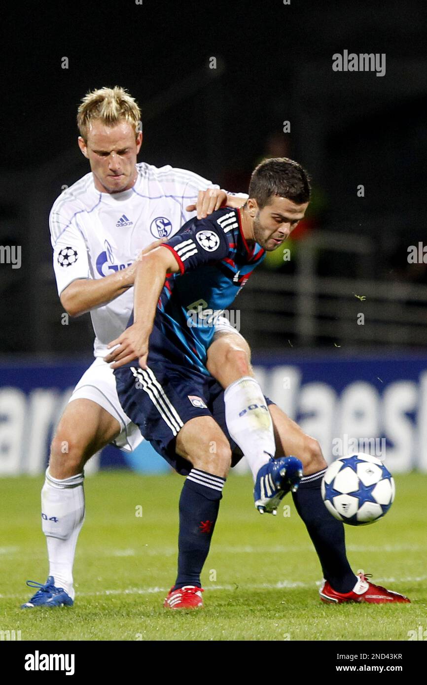 Lyon's Miralem Pjanic, right, competes for the ball with Schalke's Ivan ...