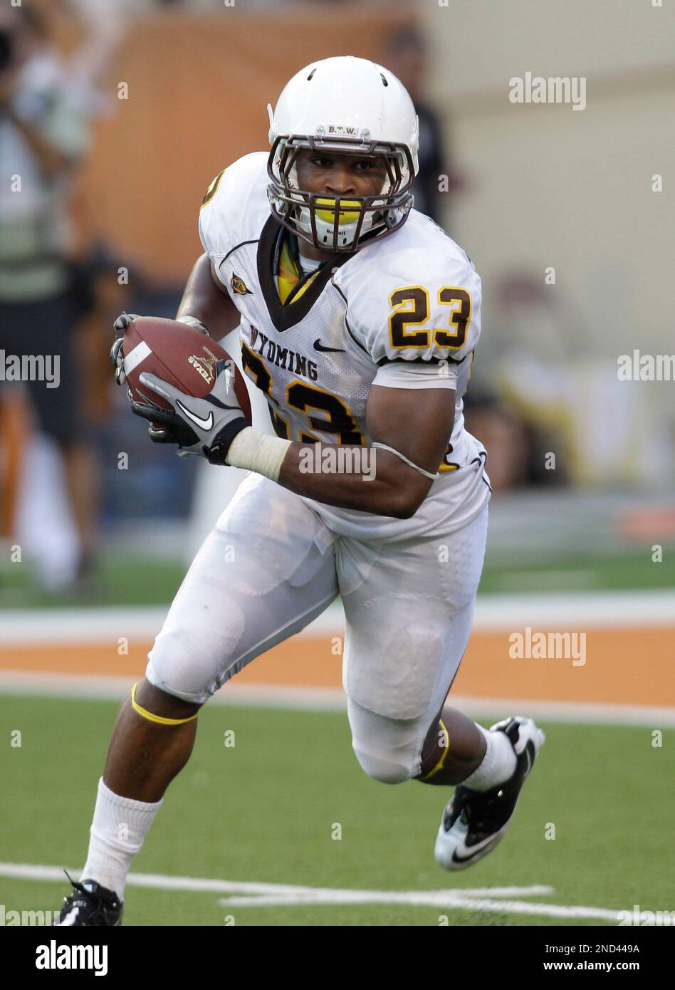 Wyoming's Ghaali Muhammad (23) runs against Texas during the first ...