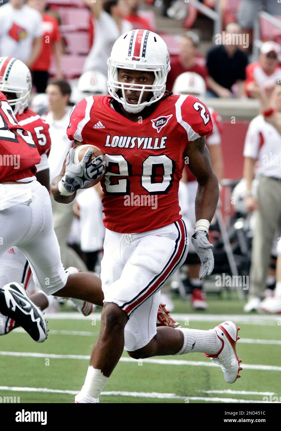 Louisville running back Victor Anderson breaks into the open against ...