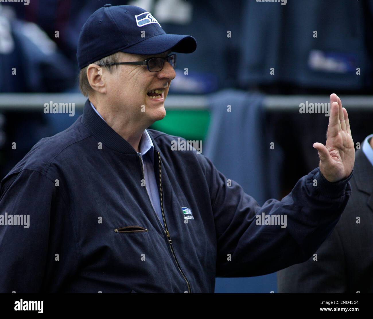 Seattle Seahawks owner Paul Allen walks on the field at the end of an ...