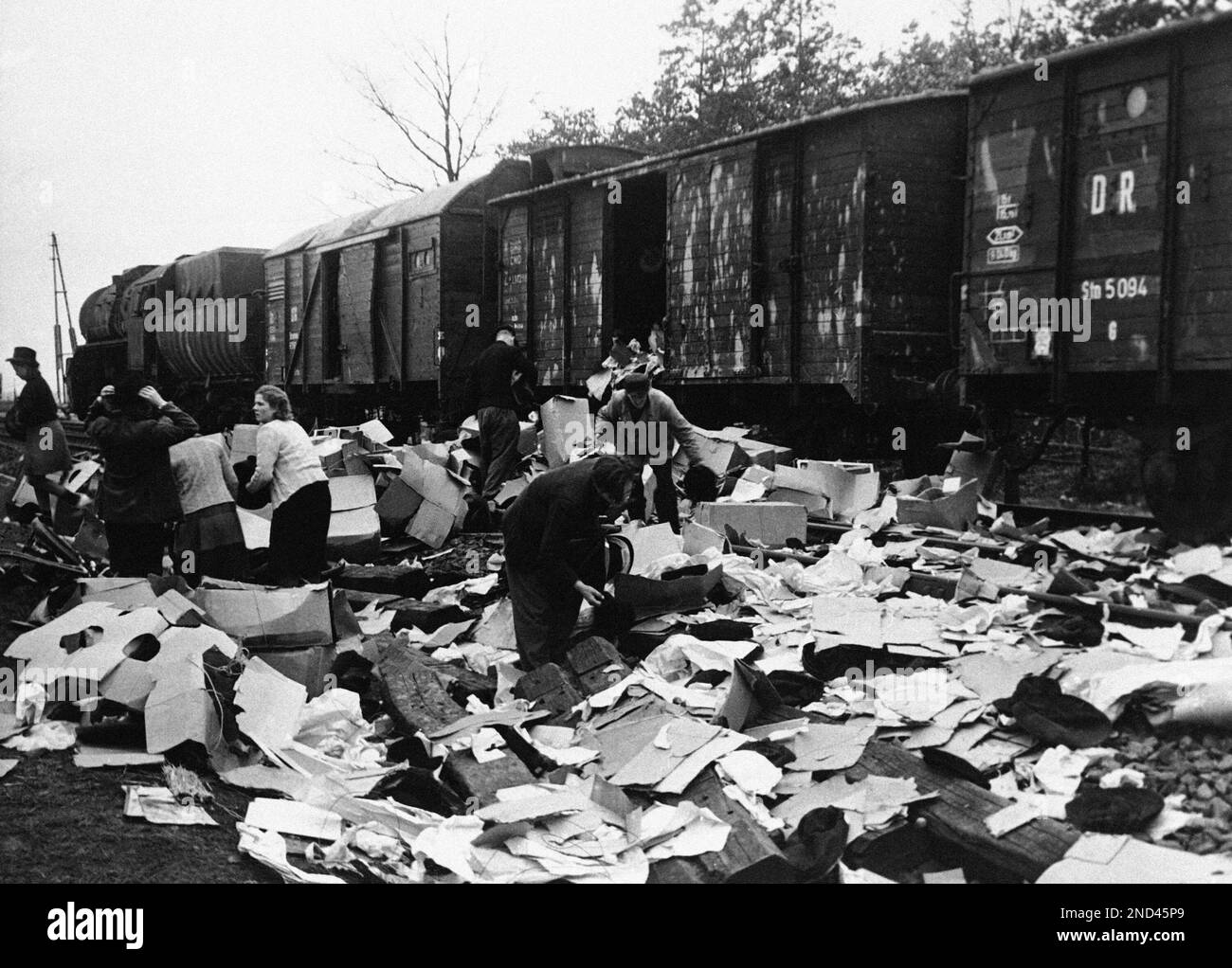 As Nazi troops retreated from the town of Darmstadt, Germany, civilians ...