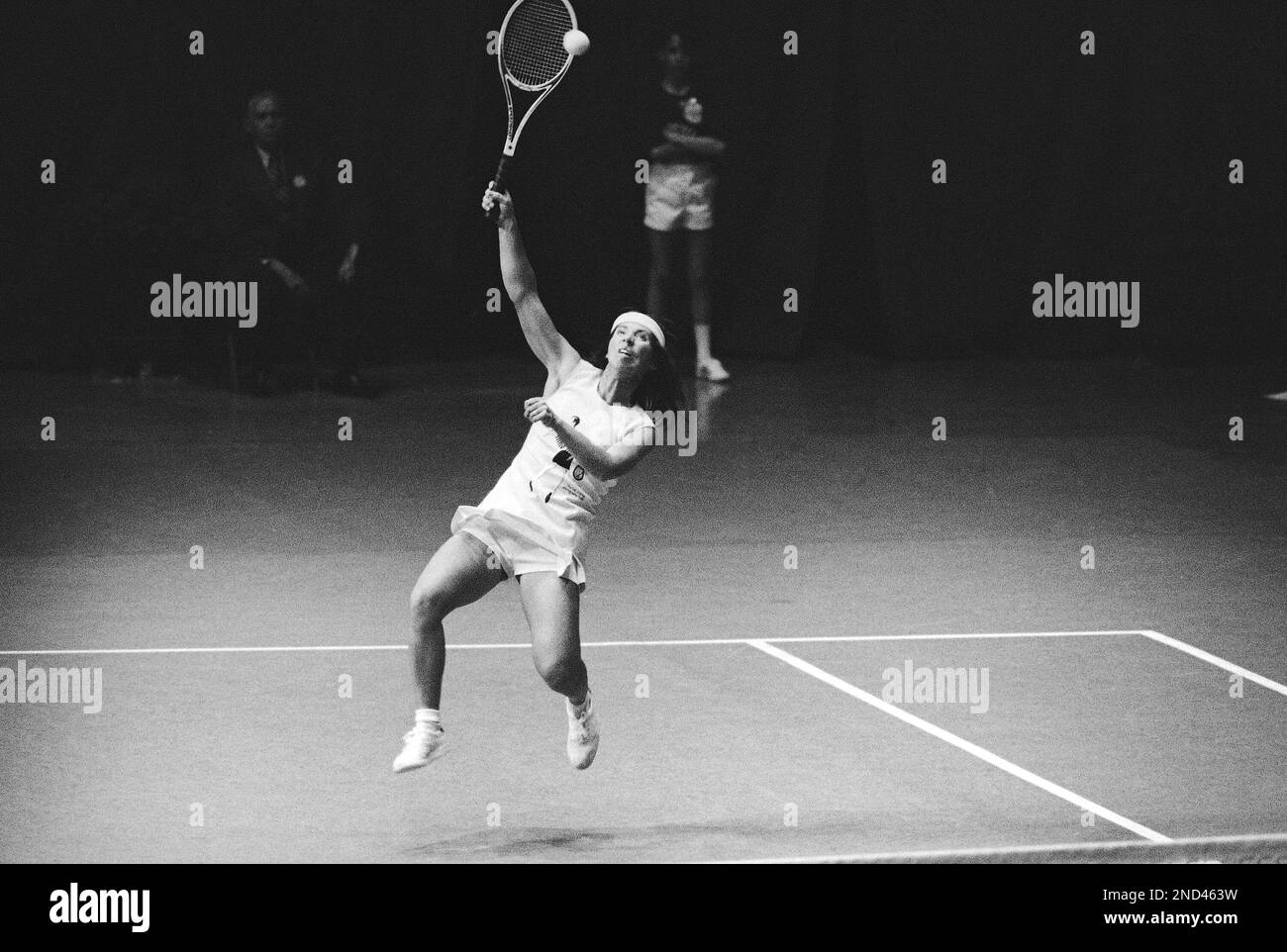 Rosemary Casals keeps an eye on the ball during her quarter finals ...