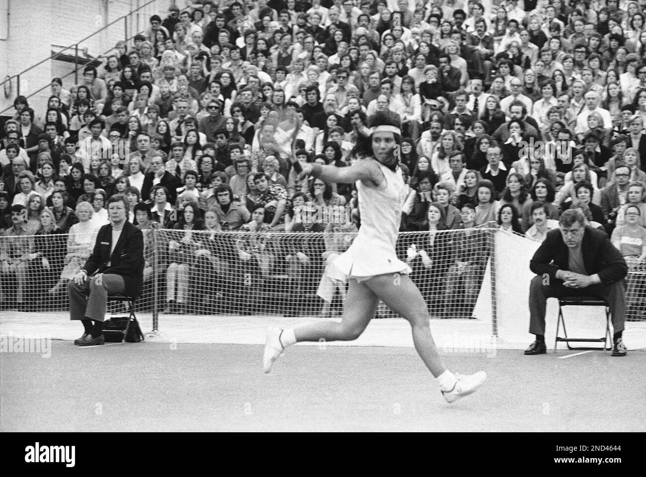 Rosie Casals returns shot by Virginia Wade during finals of the ...