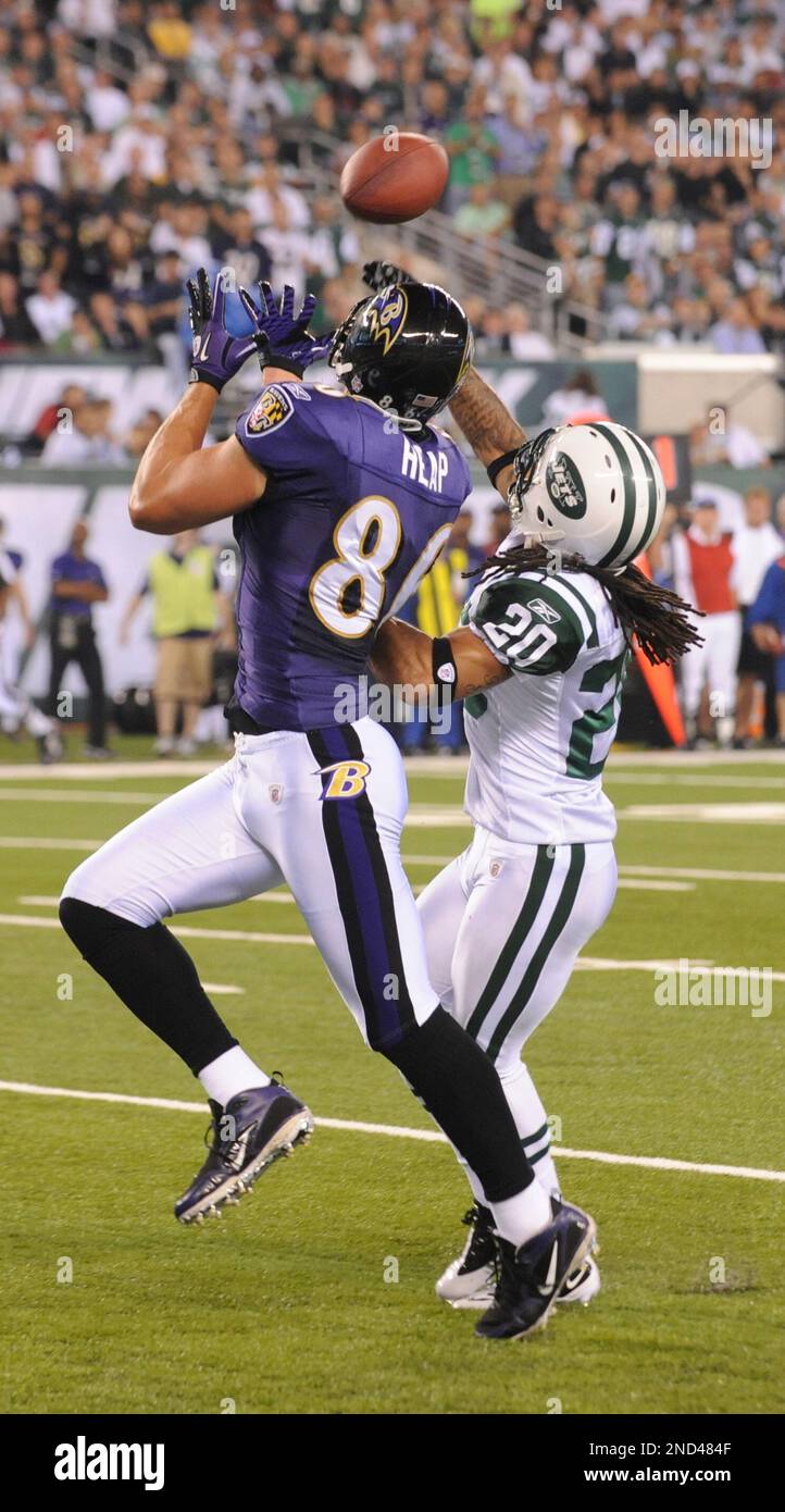 New York Jets cornerback Kyle Wilson (20) breaks up a pass to Baltimore ...
