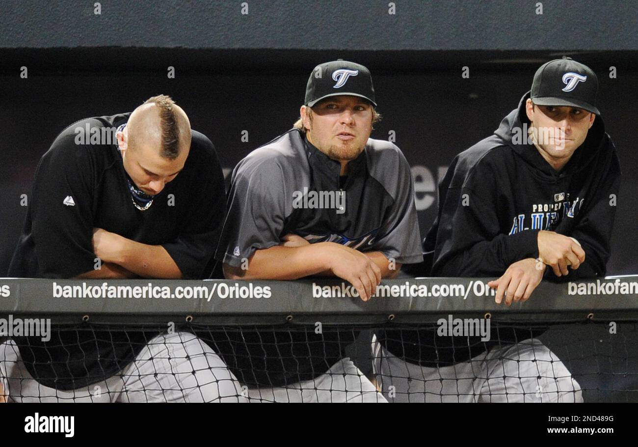 Toronto Blue Jays' Kyle Drabek, center, watches a baseball game against ...