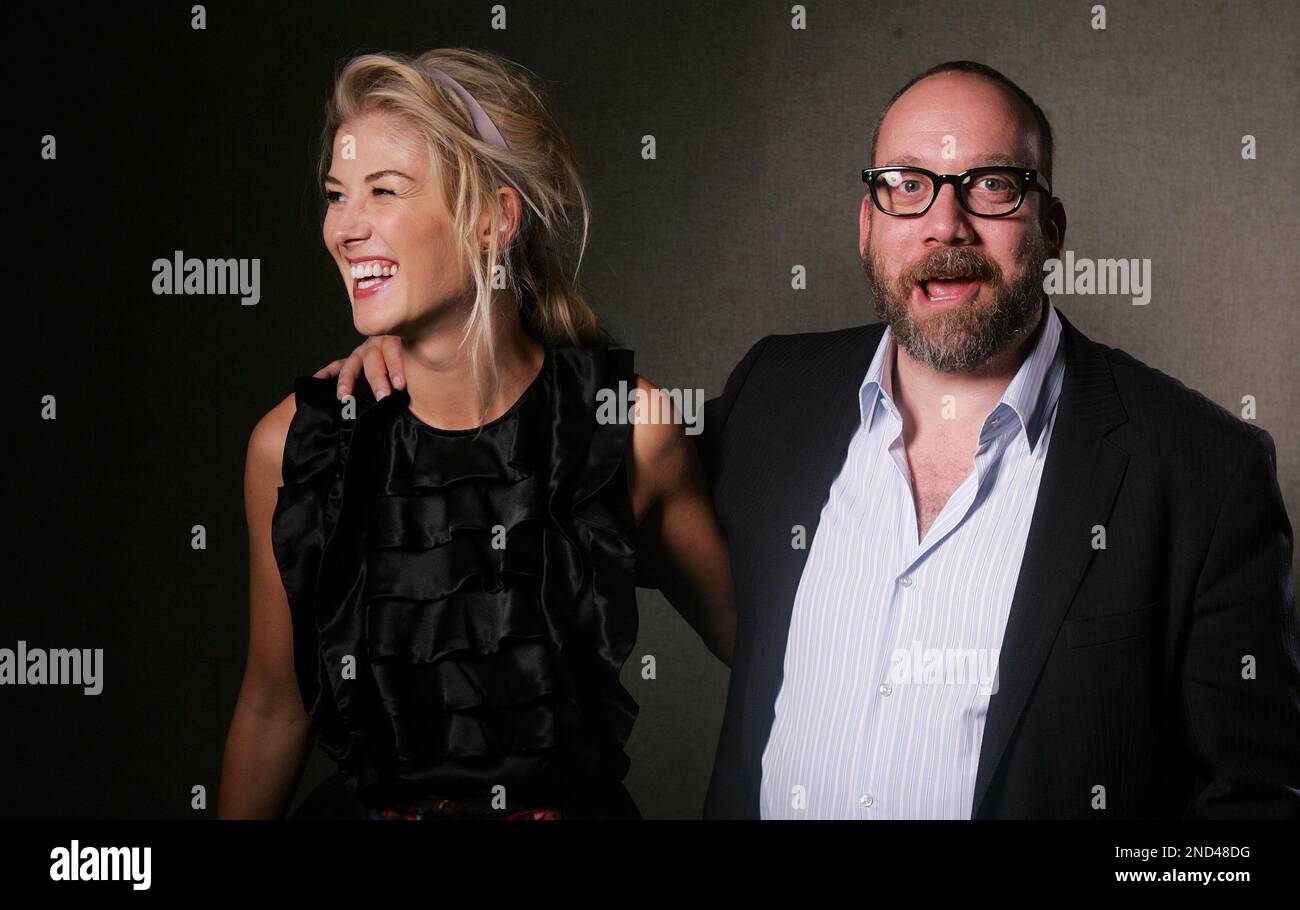 Actress Rosamund Pike (L) and actor Paul Giamatti pose for a portrait ...