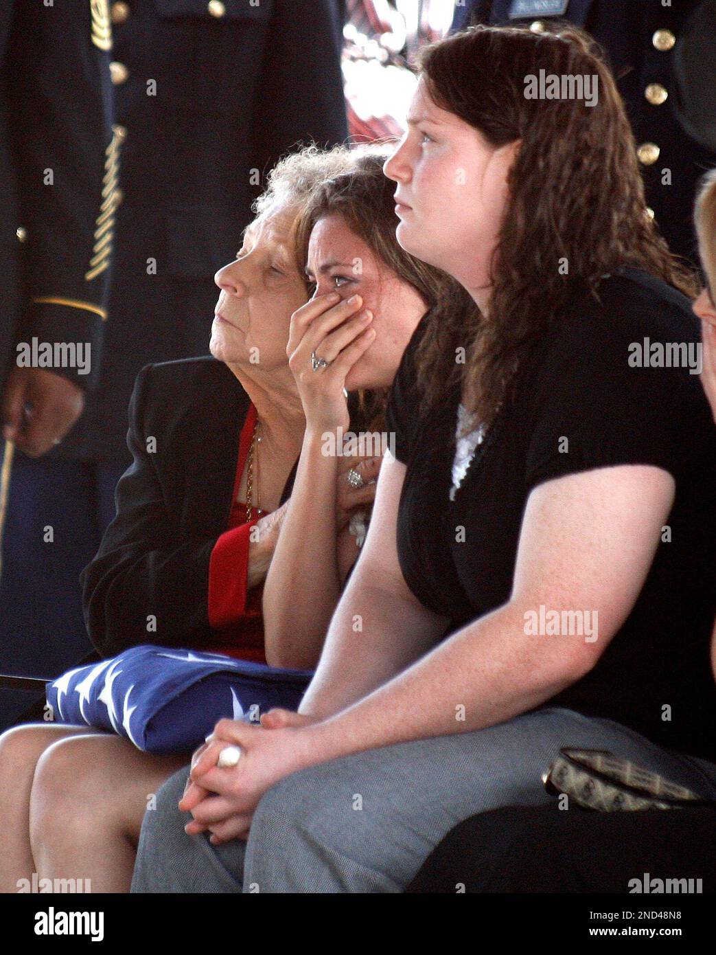 Veronica Adkinson, center, the widow of Army Ranger Staff Sgt. Vinson ...