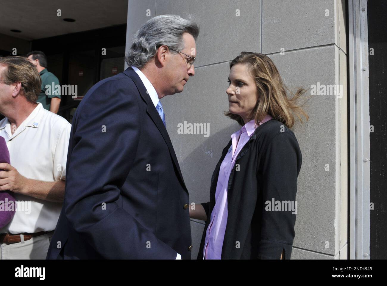 Dr. William Petit Jr., left, speaks to Debra Bond, a family friend and ...