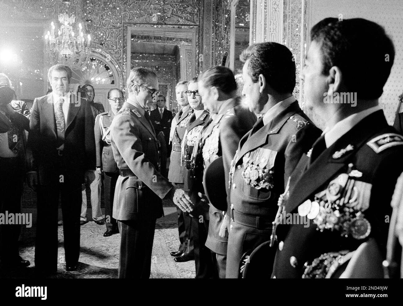 Mohammad Reza Pahlavi, Shah of Iran, left, and his top army generals at ...