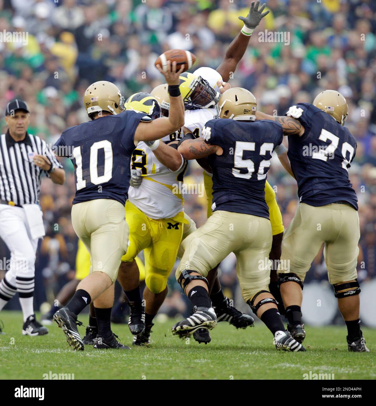 Notre Dame quarterback Dayne Crist throws over the outstretched hand of ...