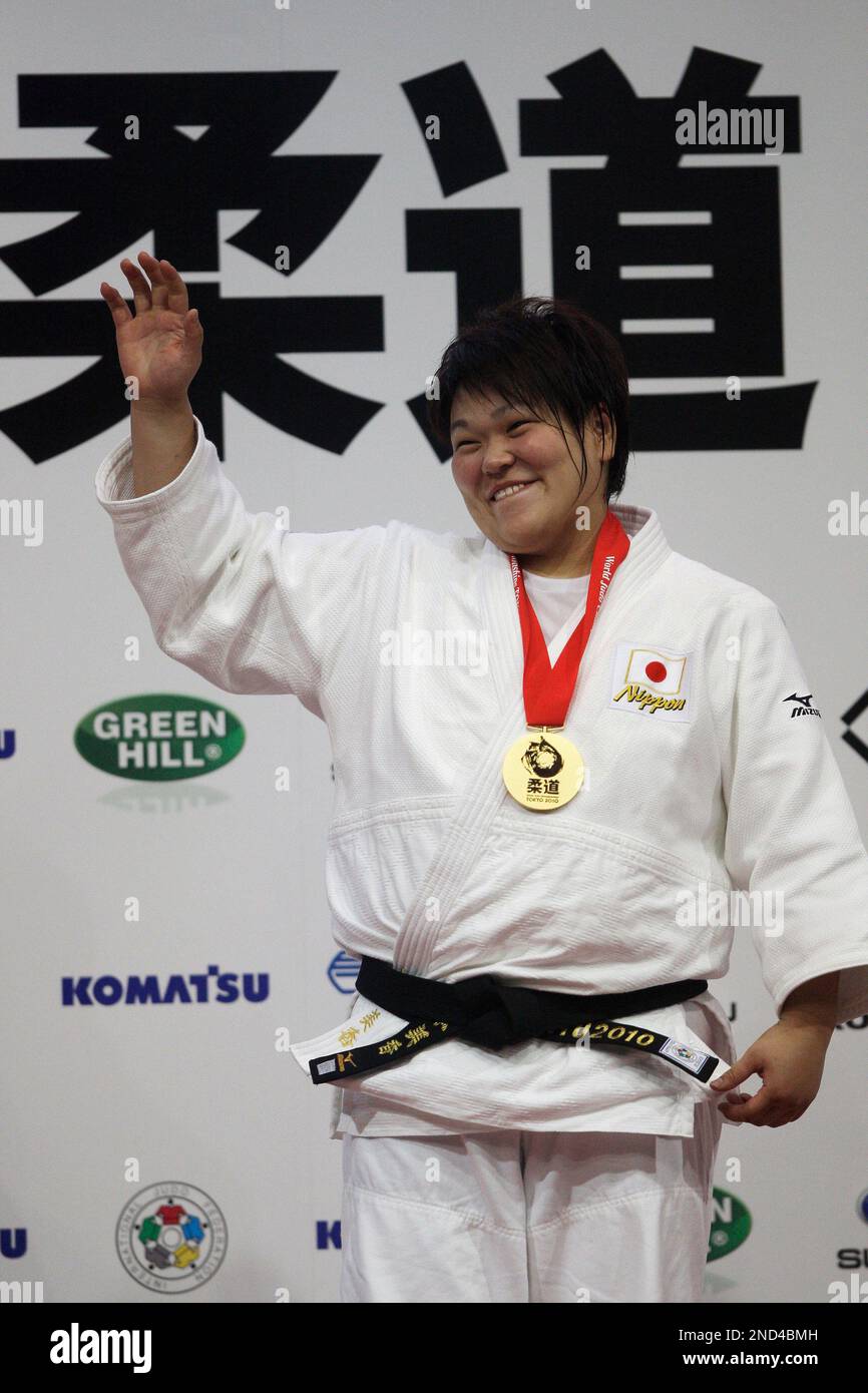 Japan's Mika Sugimoto waves after winning the gold medal in the women's open weight class match ...
