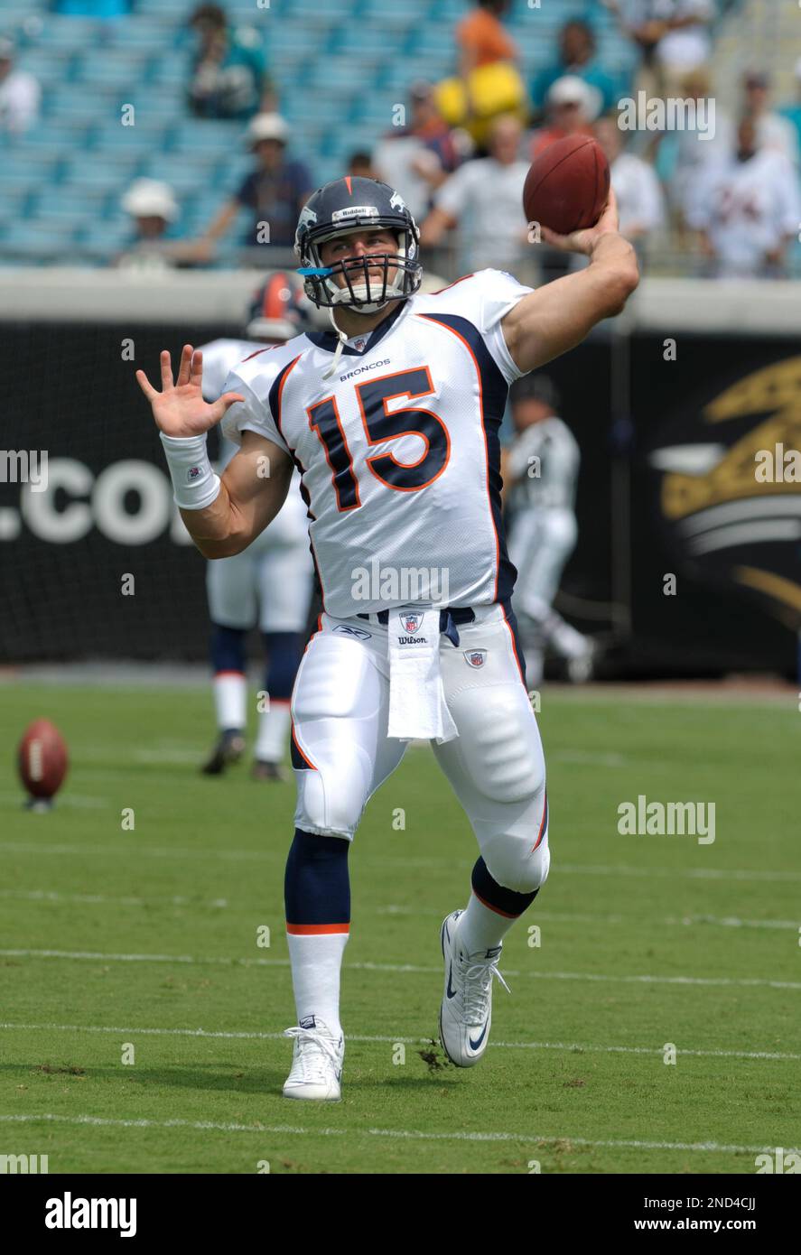 Denver Broncos quarterback Tim Tebow (15) throws during warmups prior ...