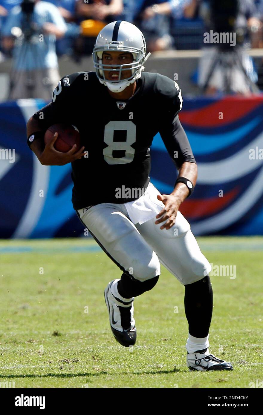 Oakland Raiders quarterback Jason Campbell (8) runs in the second half ...