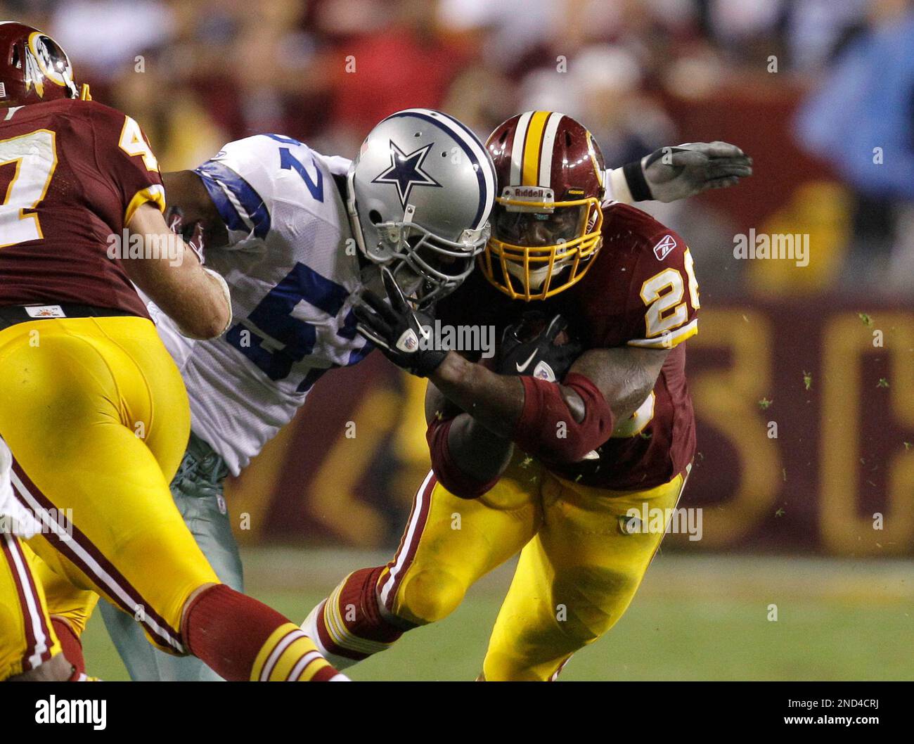 Dallas Cowboys linebacker Victor Butler (57) tackles Washington ...