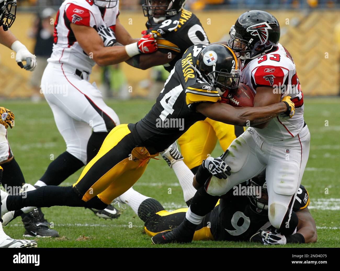 Pittsburgh Steelers cornerback Ike Taylor (24) hits Atlanta Falcons ...