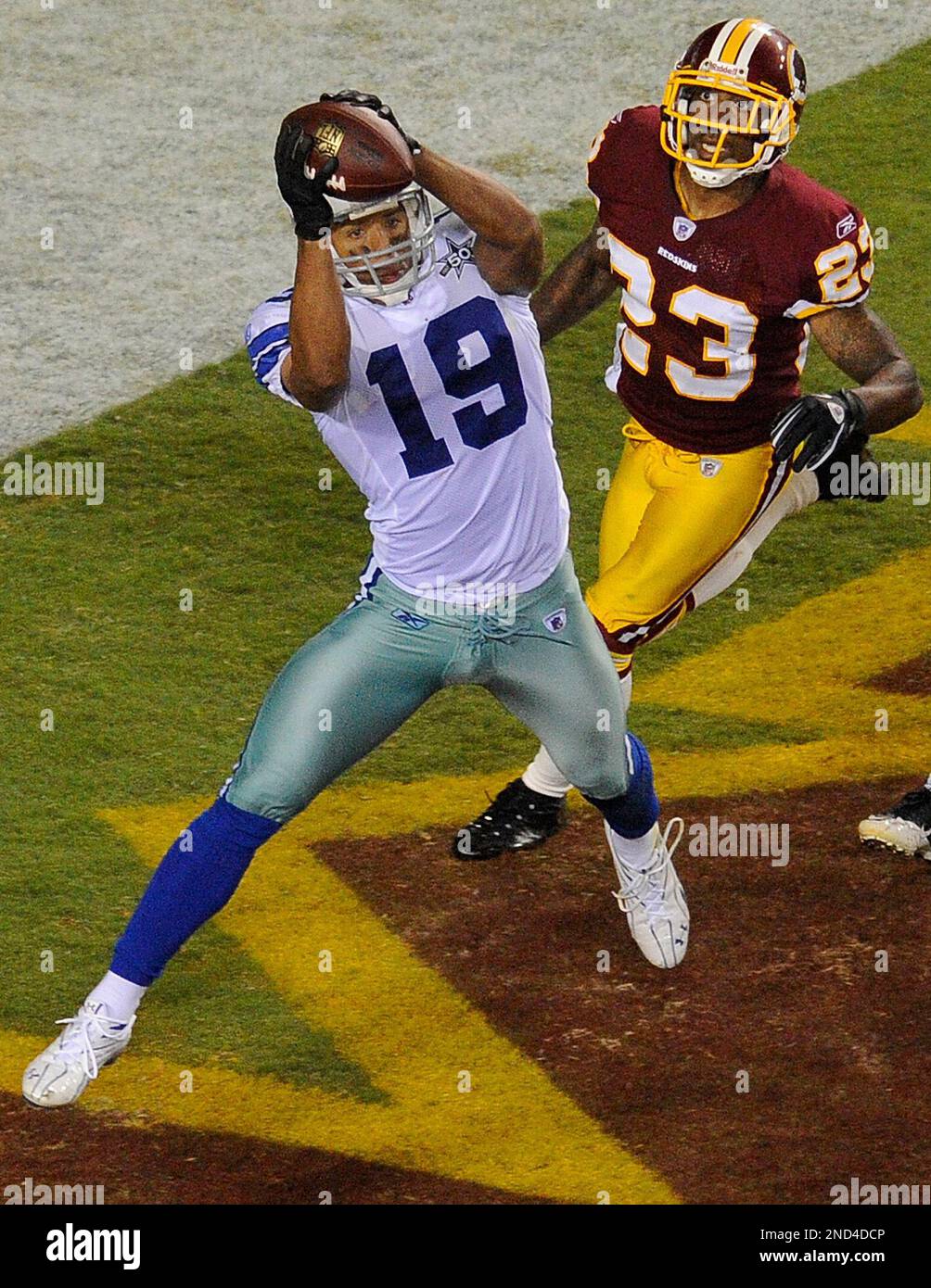 Dallas Cowboys wide receiver Miles Austin pulls in a touchdown pass as ...