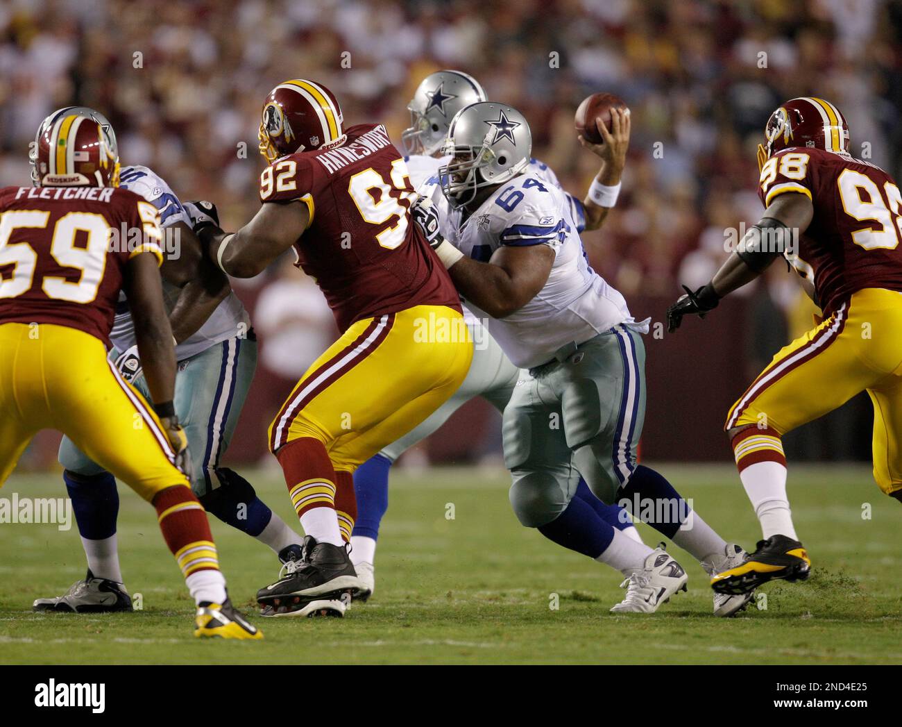 Dallas Cowboys' Montrae Holland (64) blocks Washington Redskins ...