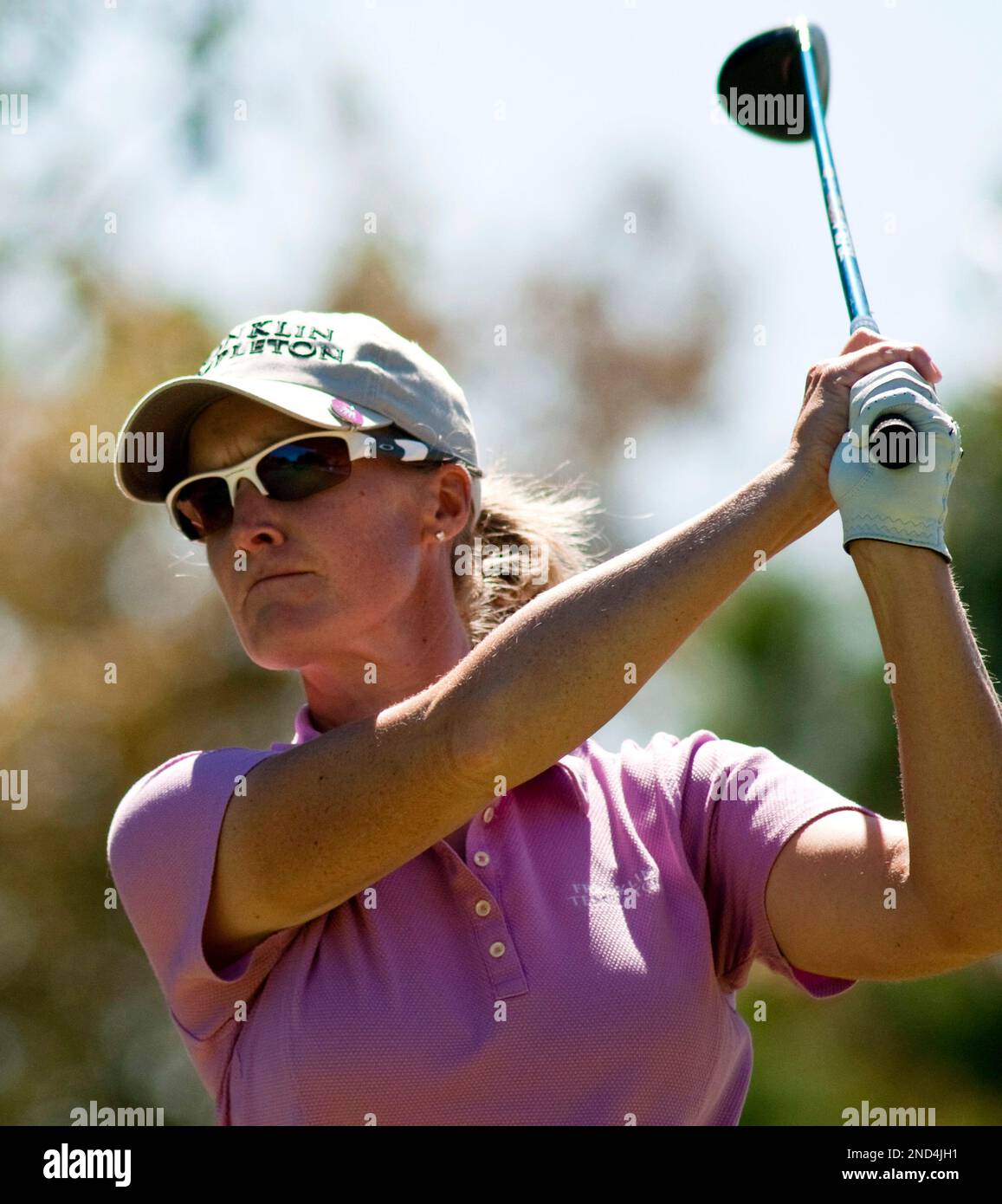 Janice Moodie watches her shot off the second tee during the final ...