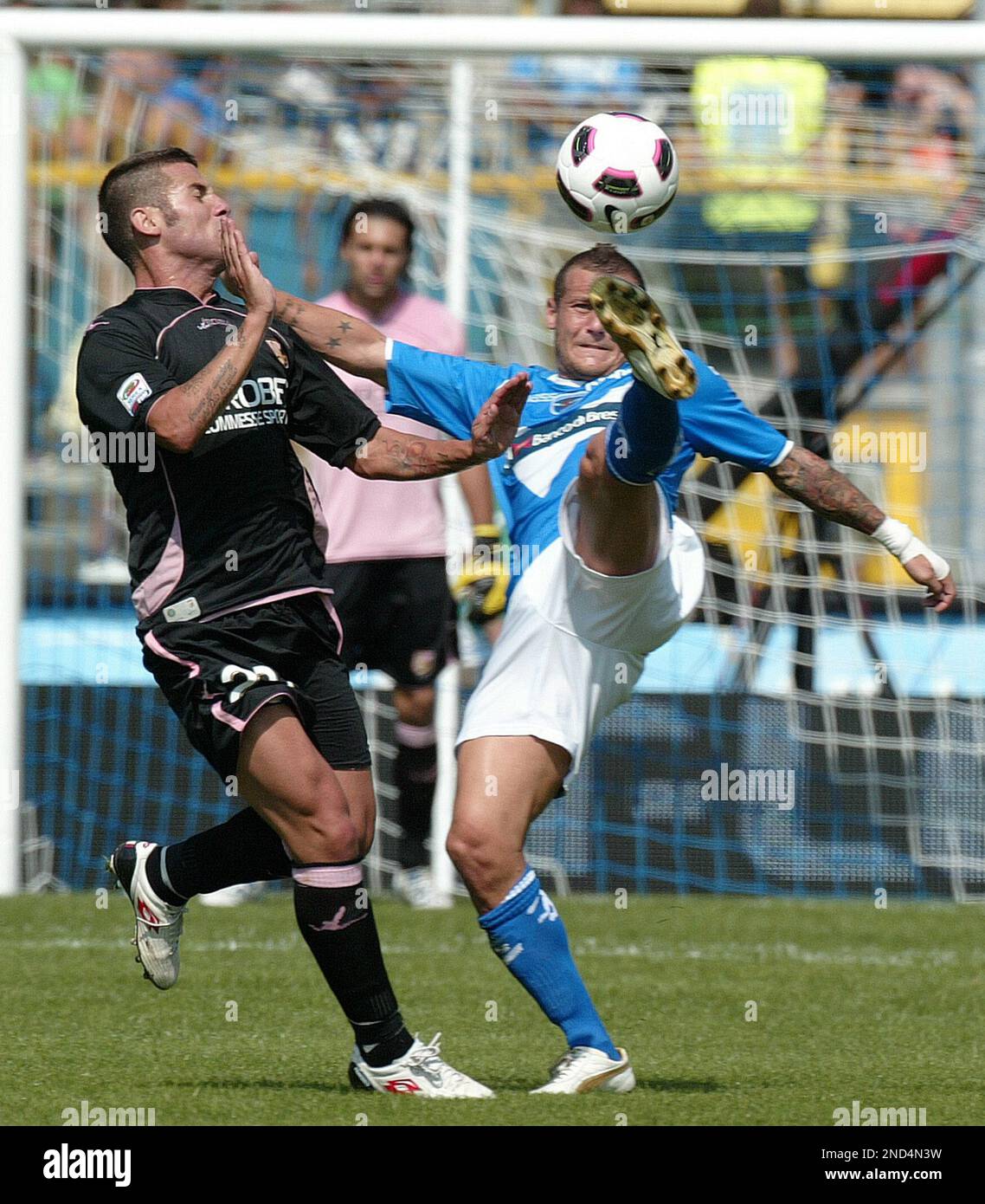 Brescia's Alessandro Diamanti, right, challenges for the ball with ...