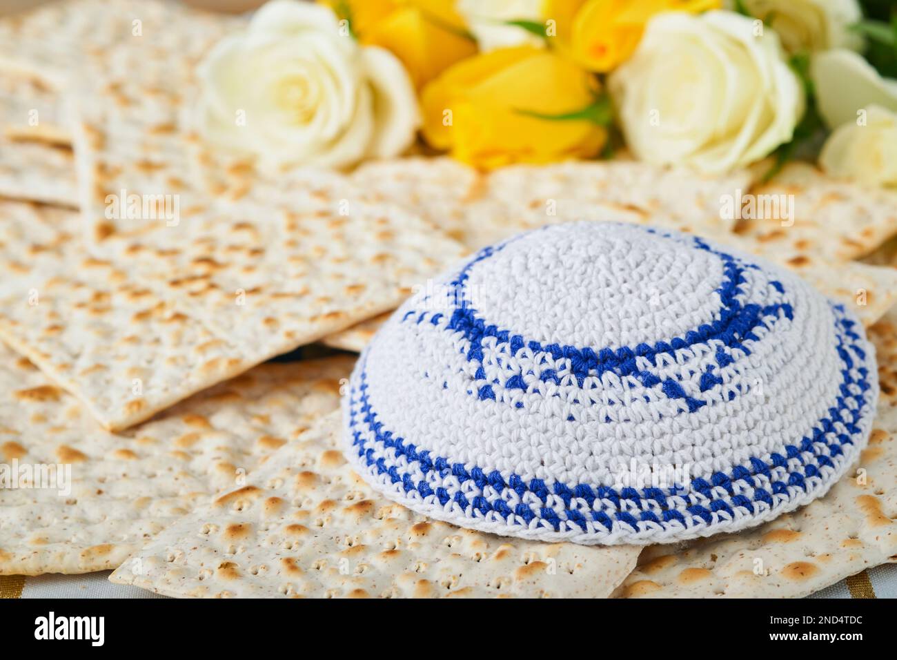 Passover celebration concept. Matzah, red kosher, white and yellow ...