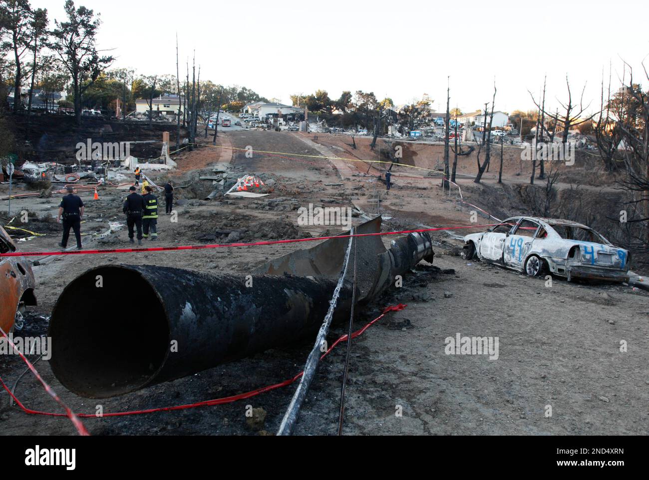 A ruptured gas pipe that caused a massive explosion is shown beside a ...
