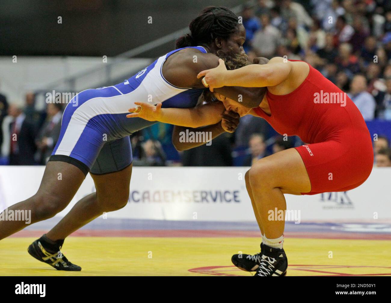 Bulgaria's Stanka Zlateva Hristova, in red, fights for the gold against ...